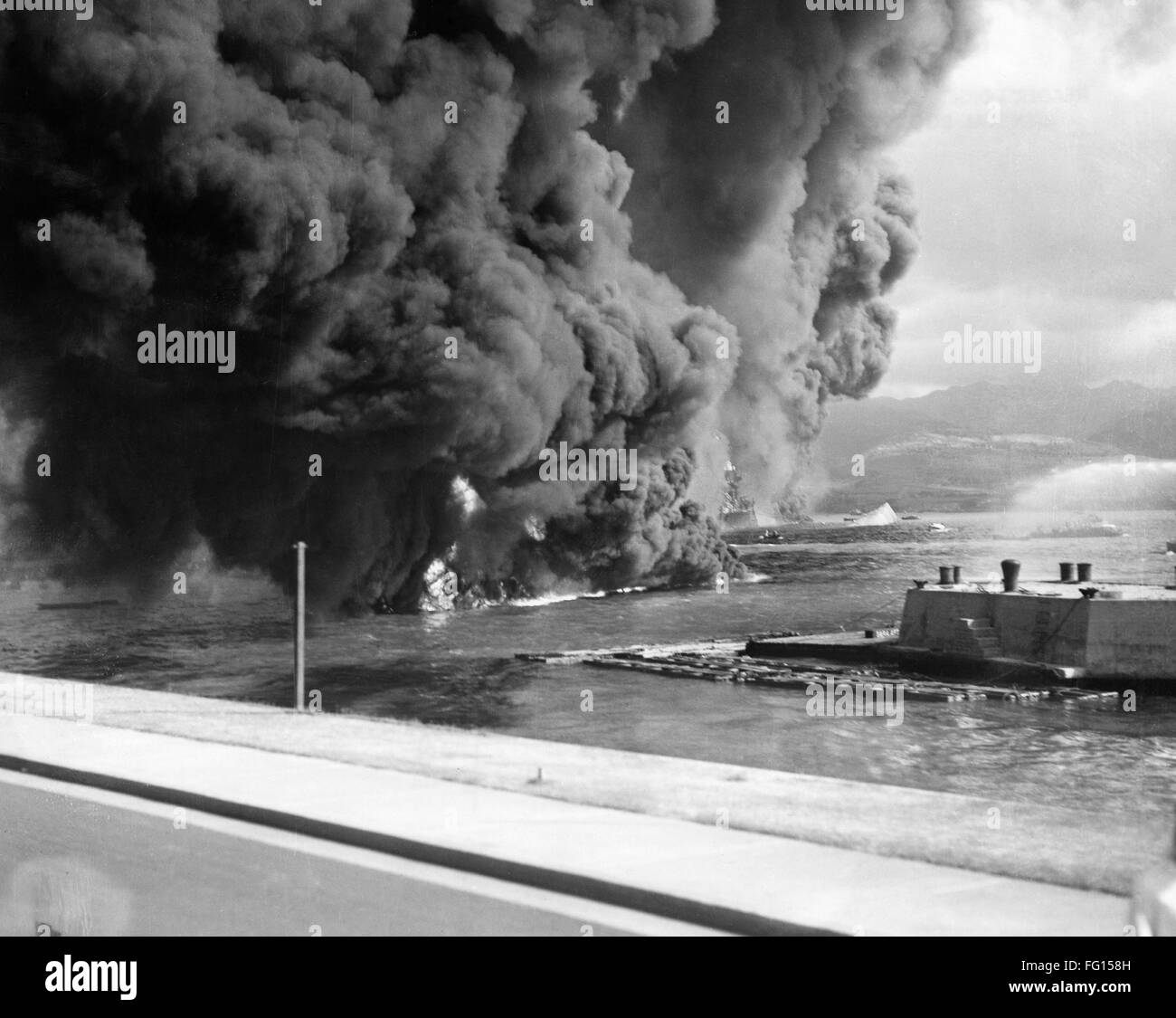 WWII: OIL FIRES, c1943. /nOil fires burning on the water near U.S. Navy ...