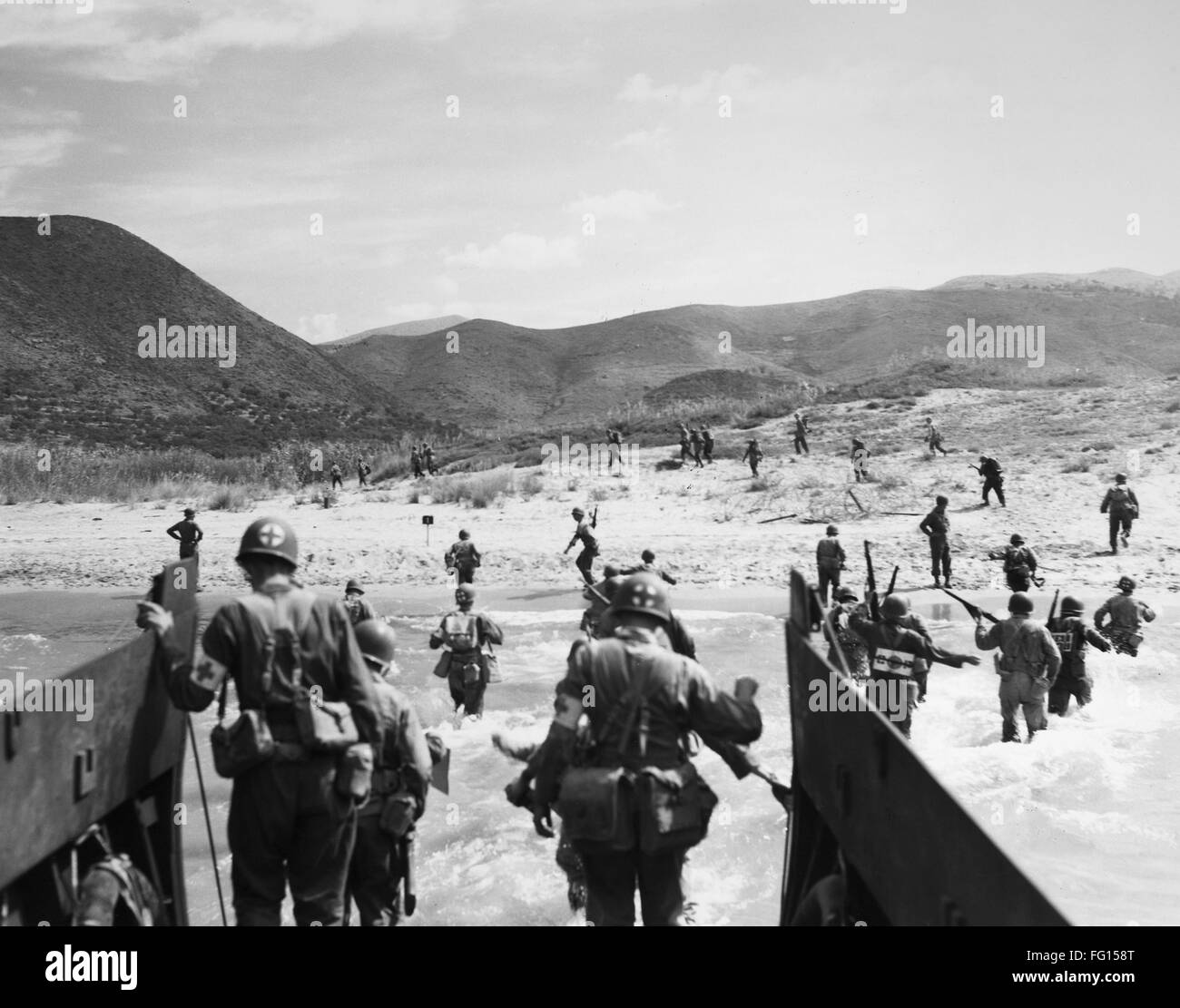 WWII: TRAINING, 1944. /nAllied troops wading ashore during a practice ...