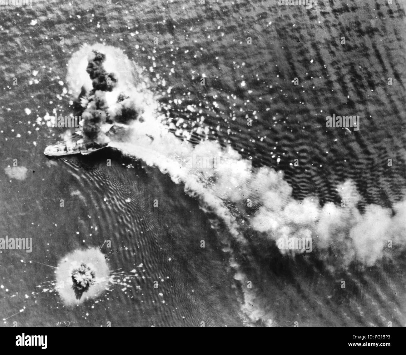 WWII: NAVAL BATTLE, 1944. /nAerial view of American bombs dropping on a ...