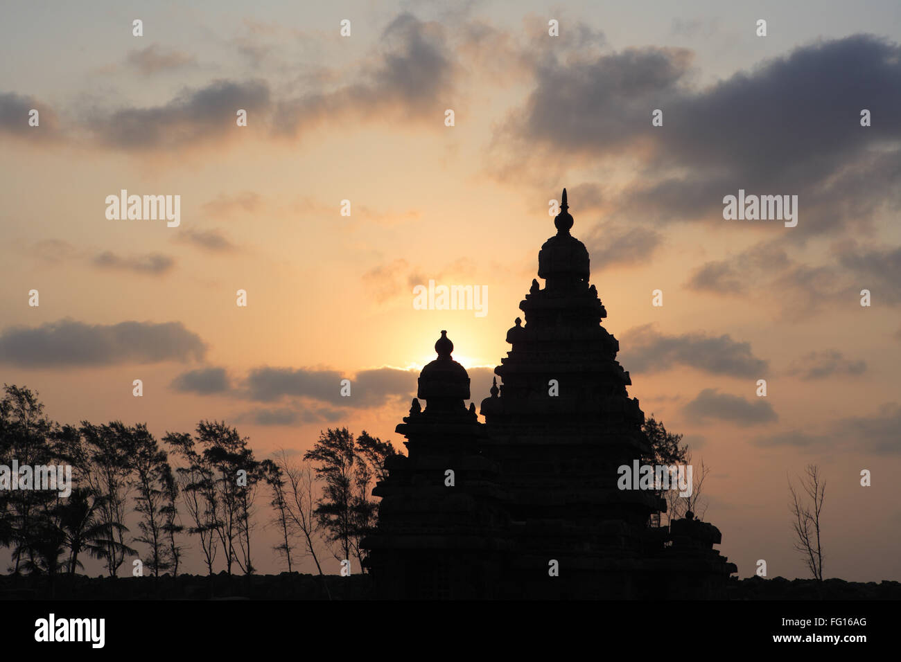 Sunrise at Shore temple dedicated to gods Vishnu and Shiva built c. 700 ...