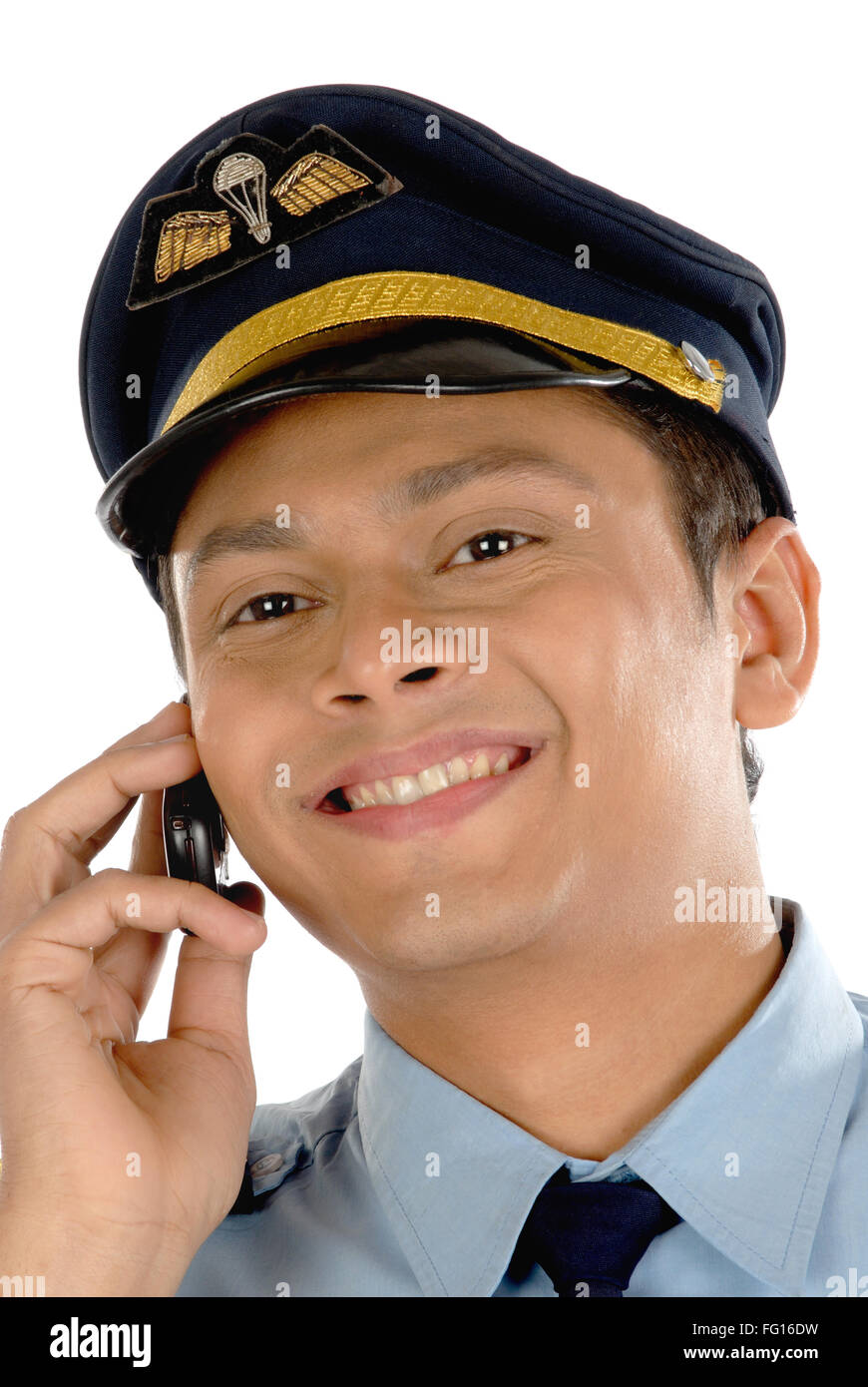 Pilot talking on mobile phone MR#782W Stock Photo - Alamy