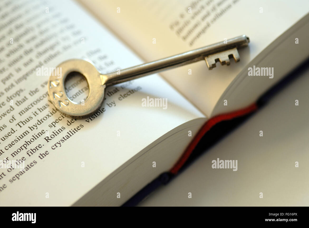 key of knowledge education book Stock Photo - Alamy