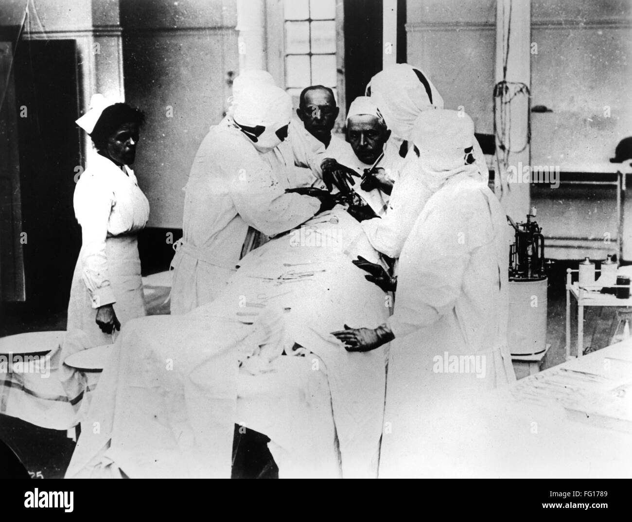 WORLD WAR I: HOSPITAL. /nDoctors operating on a soldier in a field ...
