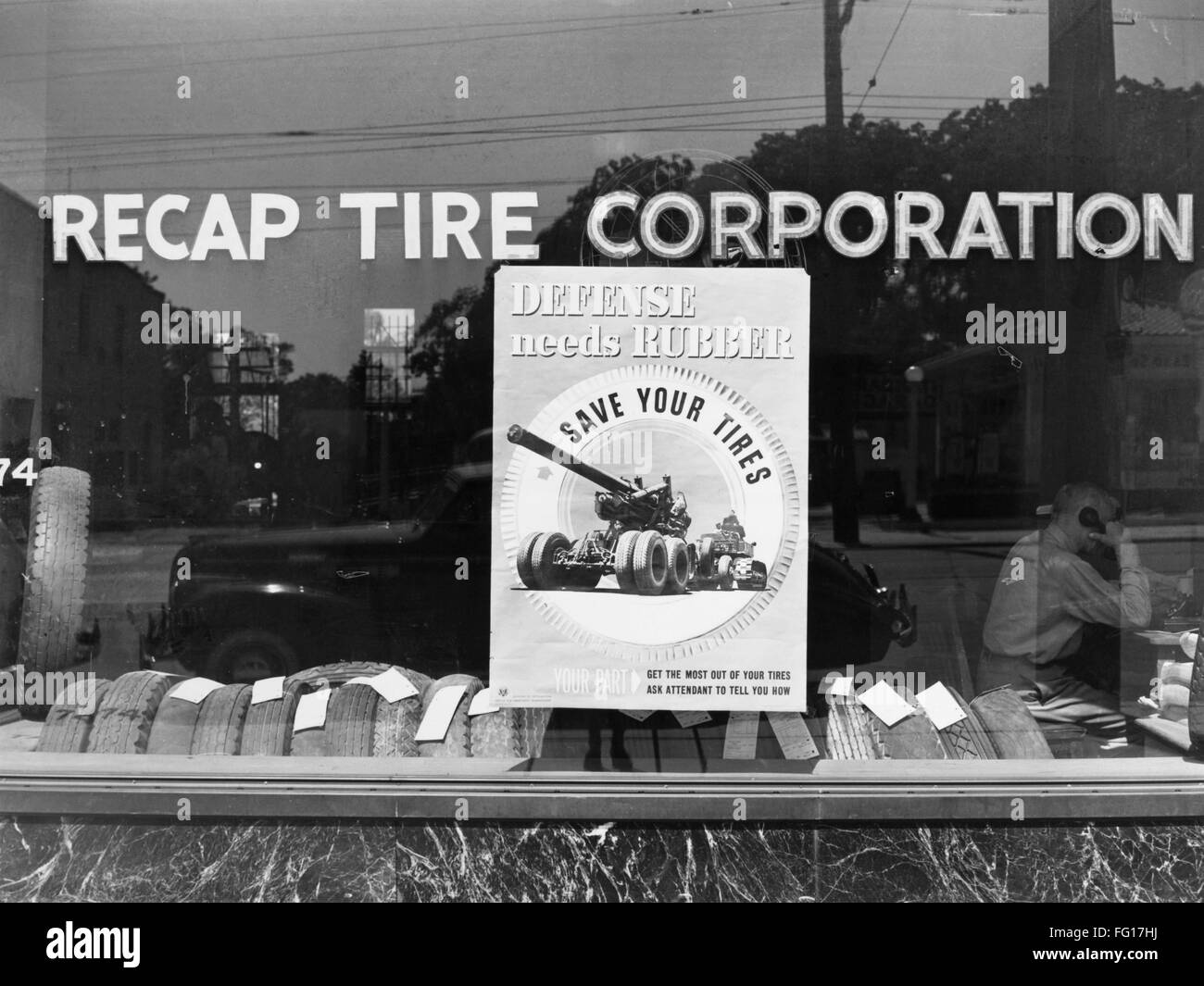 WWII: HOMEFRONT, 1942./nA view of the window of the Recap Tire ...