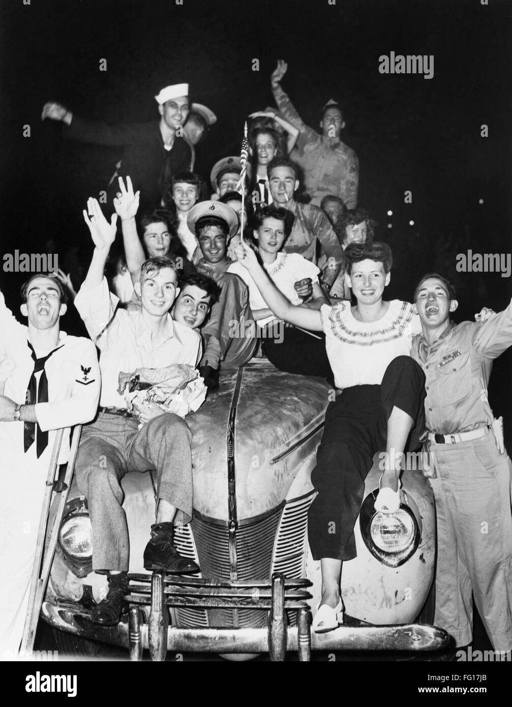 WWII: V-J DAY, 1945. /nA group of people in Washington D.C. celebrating ...