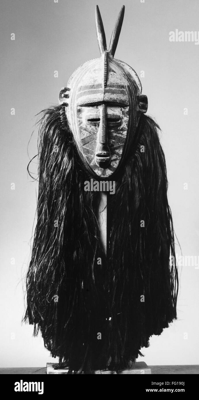 WEST AFRICA: MASK. /nCarved wooden mask with fiber trim, made by the ...