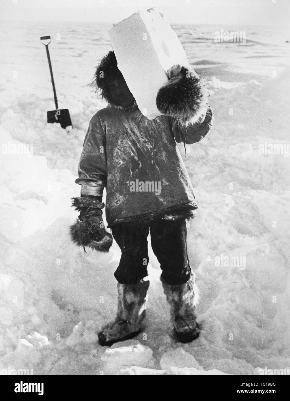 NATIVE AMERICAN: ICE. /nA Native American carrying an ice block ...