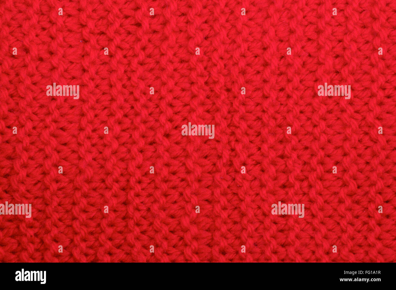 Red knitted background close up in detail Stock Photo - Alamy