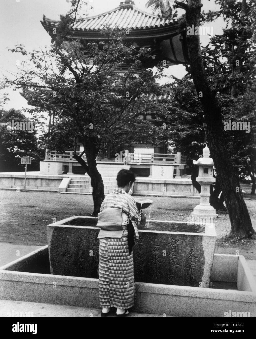 JAPAN: SHINTO SHRINE, 1972. /nA Japanese women wearing a kimono ...