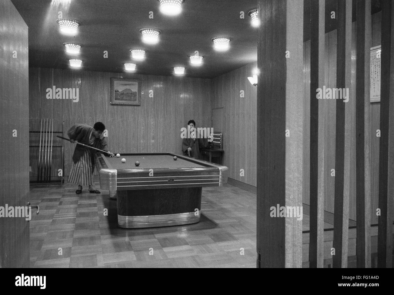 JAPAN: GAME ROOM. /nA Japanese man and woman playing pool. Photograph ...