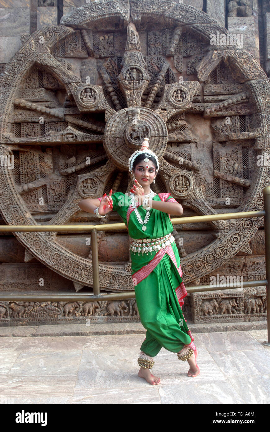 Dancer performing classical traditional odissi dance at Konarak Sun temple , Konarak , Orissa ...