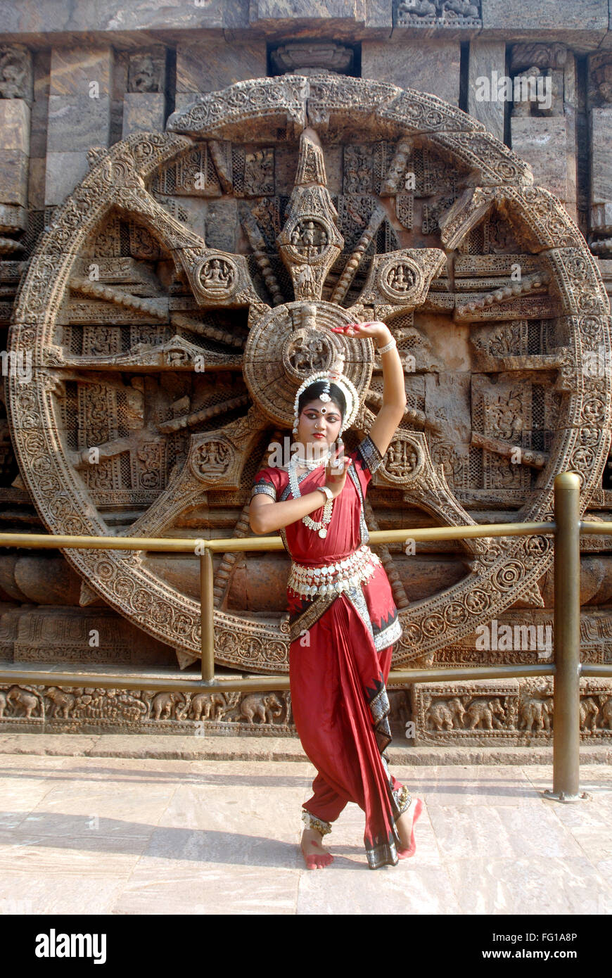 Dancer performing classical traditional odissi dance at Konarak Sun temple , Konarak , Orissa ...