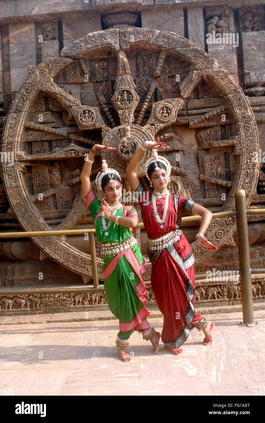 Dancers performing classical traditional odissi dance at Konarak Sun temple , Konarak , Orissa ...