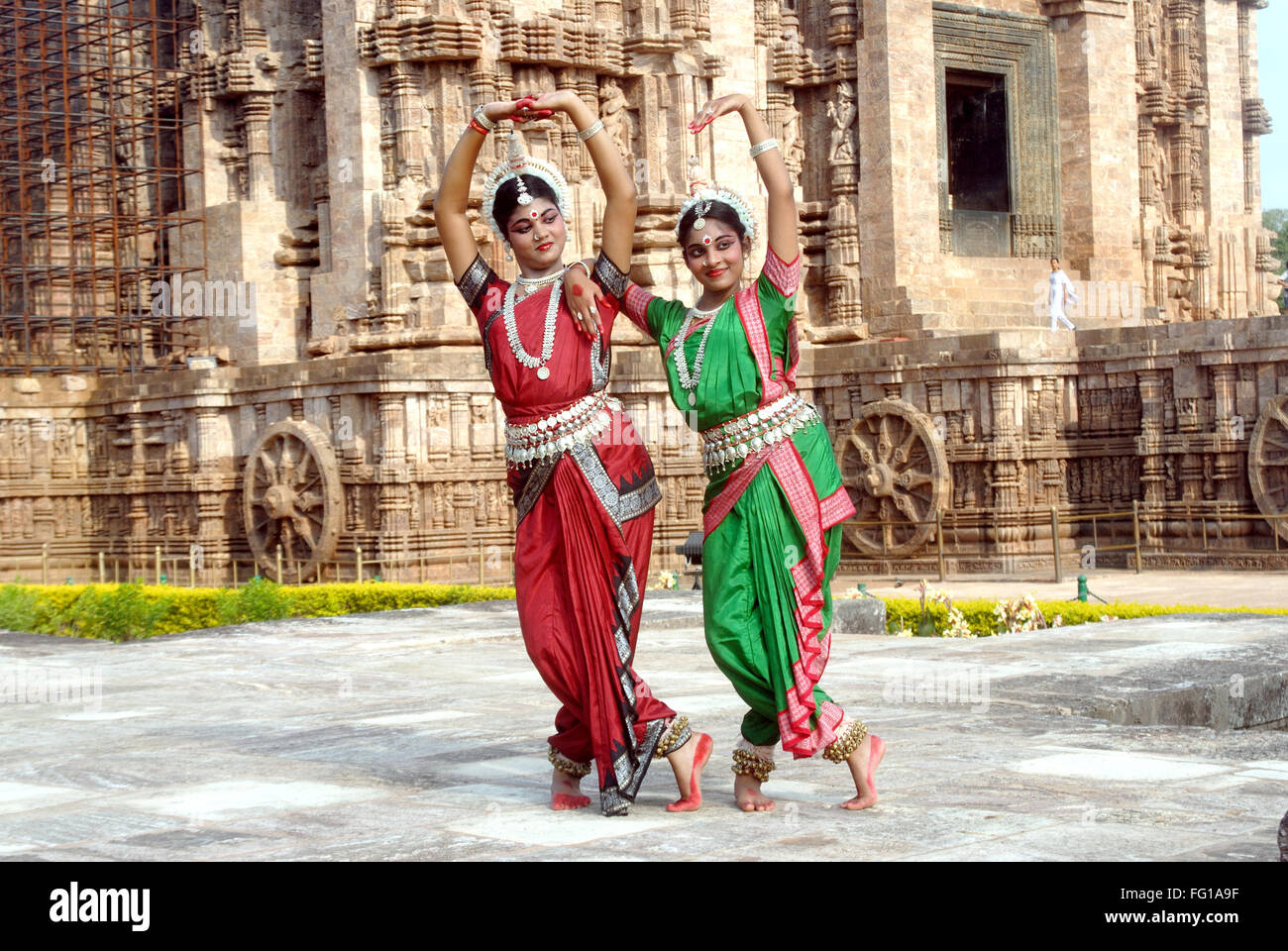 Dancers performing classical traditional odissi dance at Konarak Sun temple , Konarak , Orissa ...