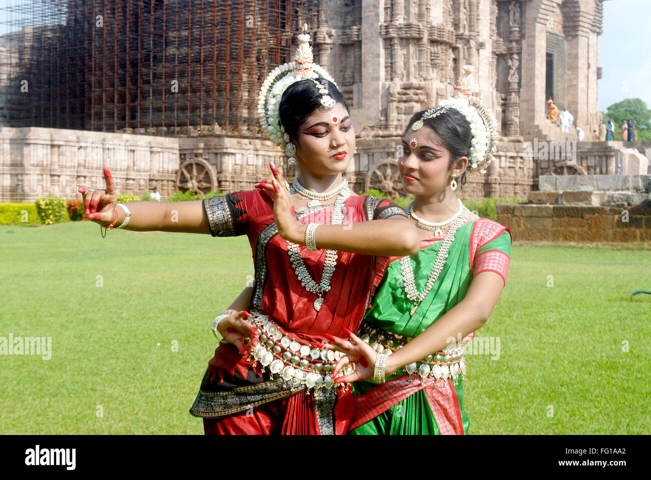 Dancers performing classical traditional odissi dance at Konarak Sun temple , Konarak , Orissa ...