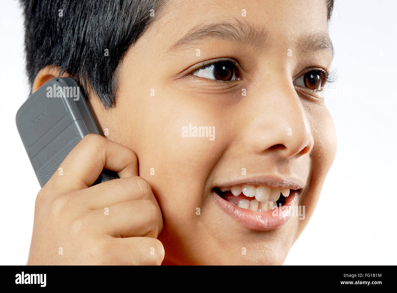 Boy talking on cell phone MR#152 Stock Photo - Alamy