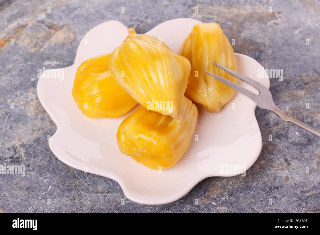 Tropical fruit Jackfruit (jakfruit, jack, jak) on plate with fork ...
