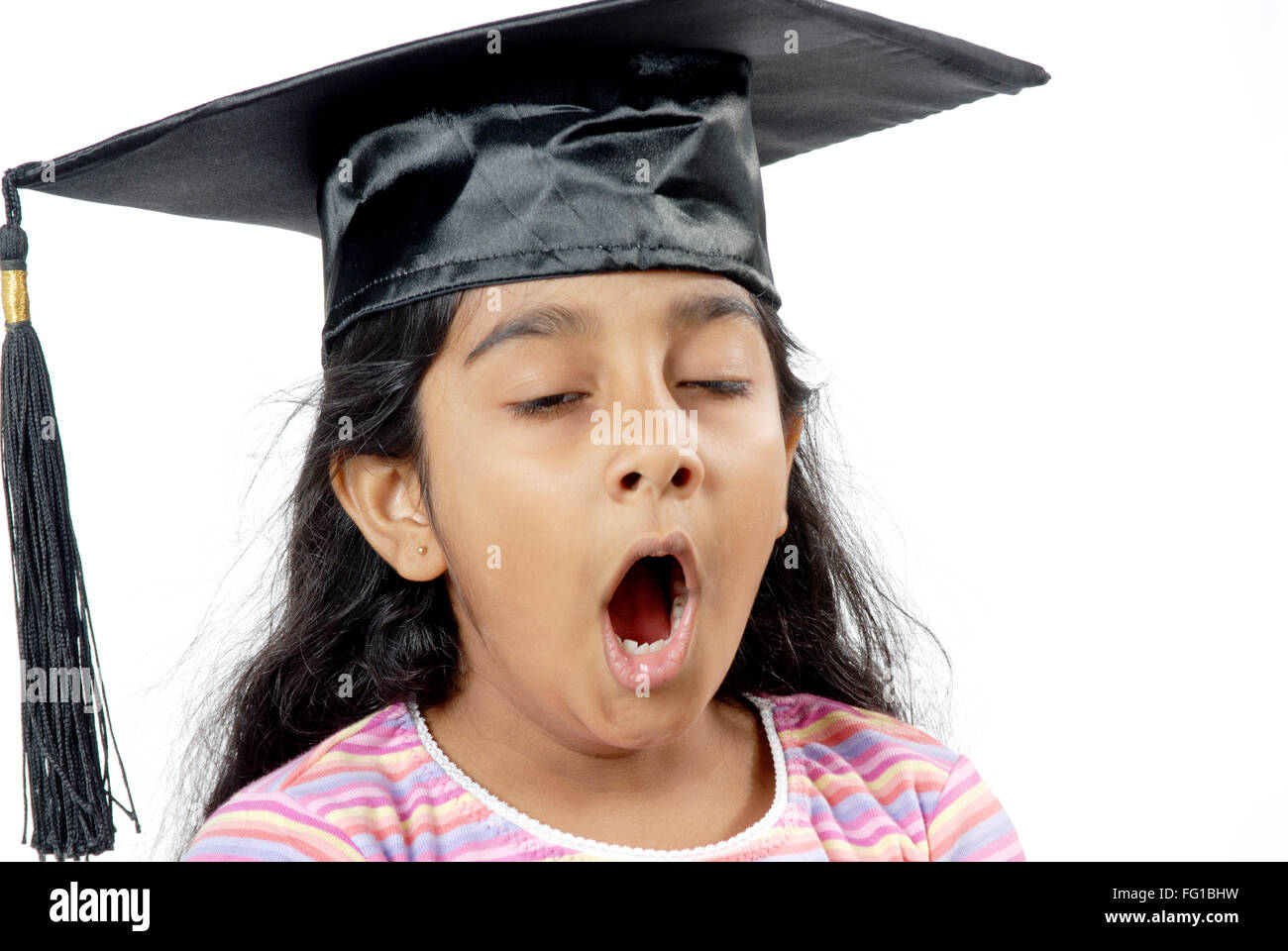 Young girl wearing graduation cap yawning dreaming for LLB MR#152 Stock ...