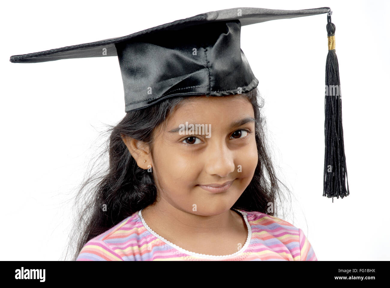 Young girl wearing graduation cap dreaming for LLB MR#152 Stock Photo ...