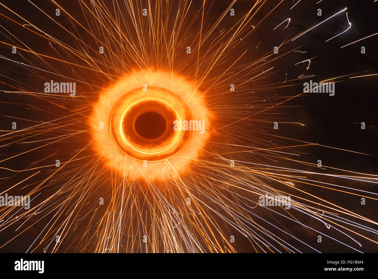 Fire cracker burning Stock Photo - Alamy