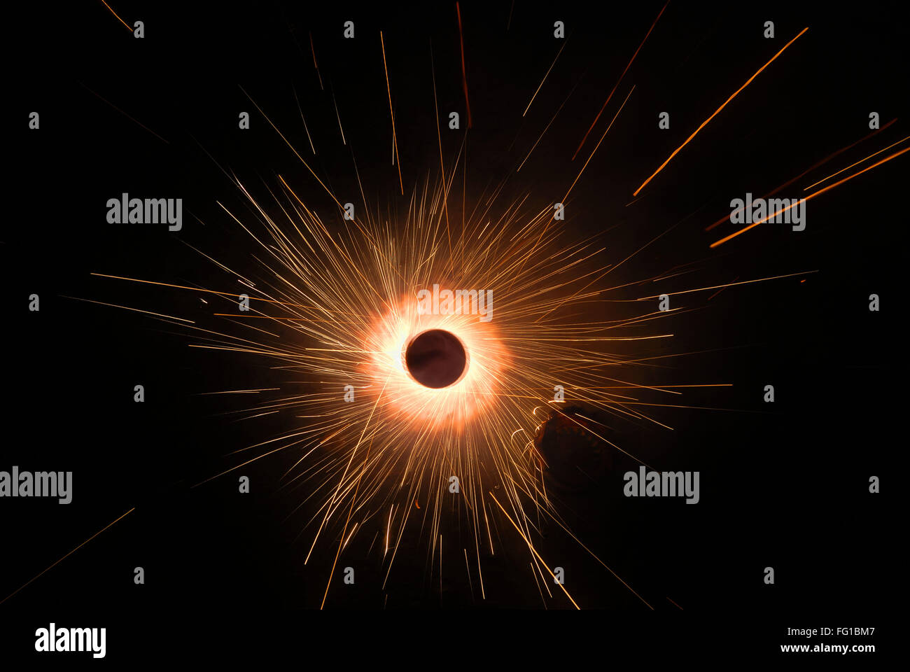 Fire cracker burning Stock Photo - Alamy