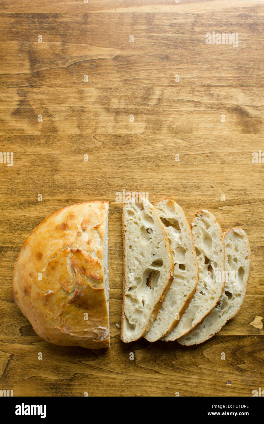 A round, golden brown loaf of homemade artisan bread Stock Photo - Alamy