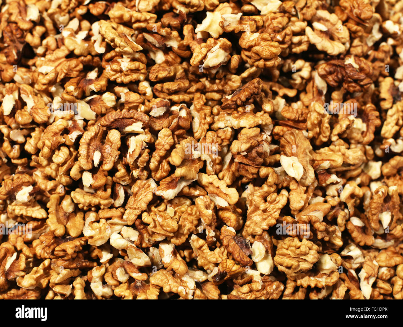 Fresh walnuts without shell as a background Stock Photo - Alamy