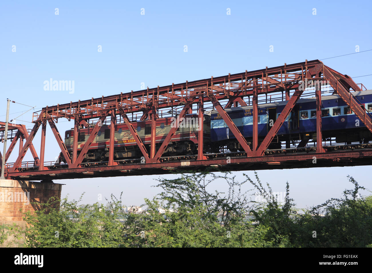 Indian railway passing on combined bridge for train and road transport ...