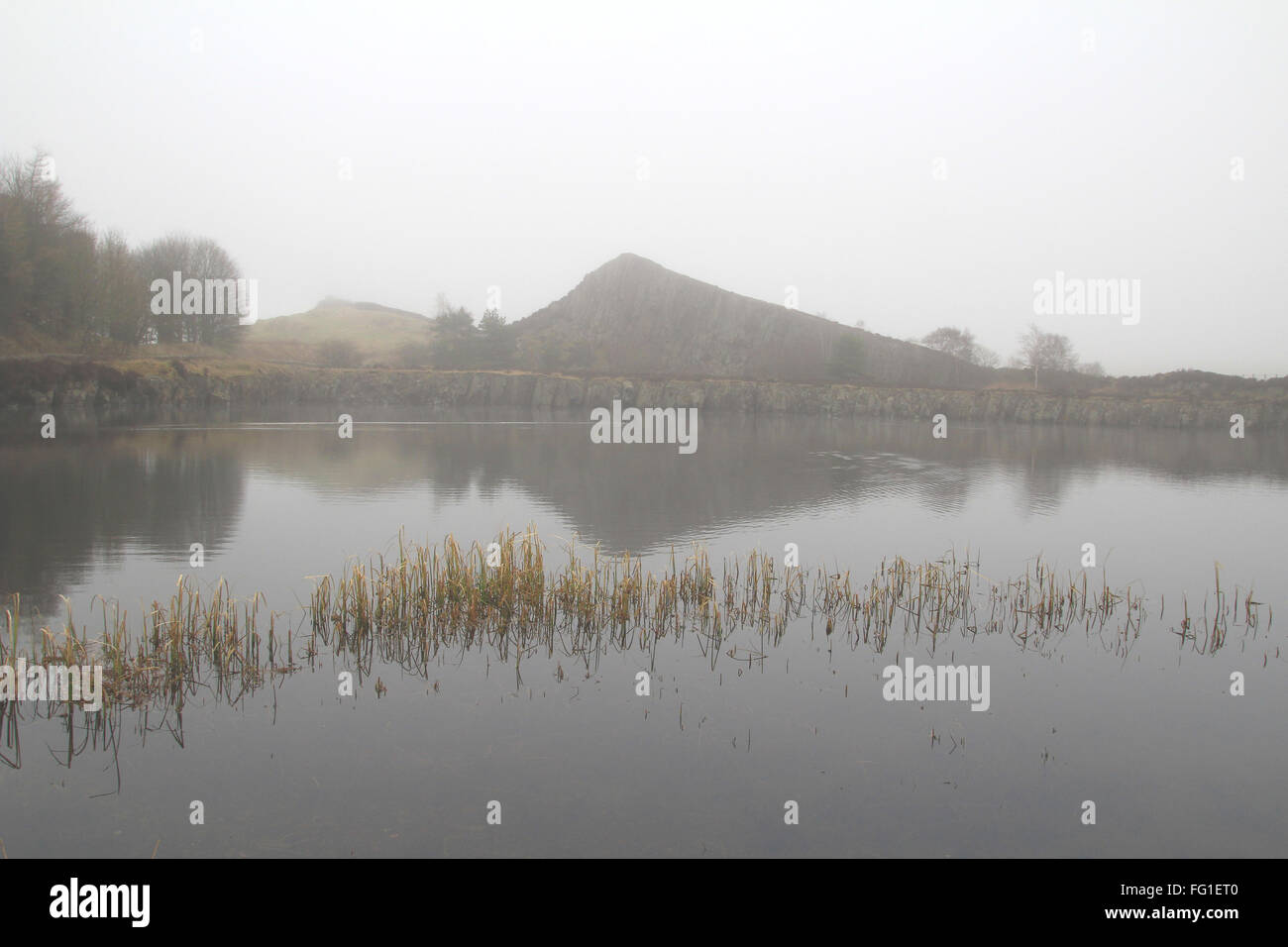 Misty morning at Cawfields quarry, Hadrian's Wall Stock Photo - Alamy
