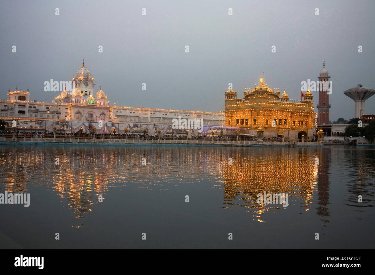 Illuminated Harimandir Sahib swarn mandir or golden temple reflection ...