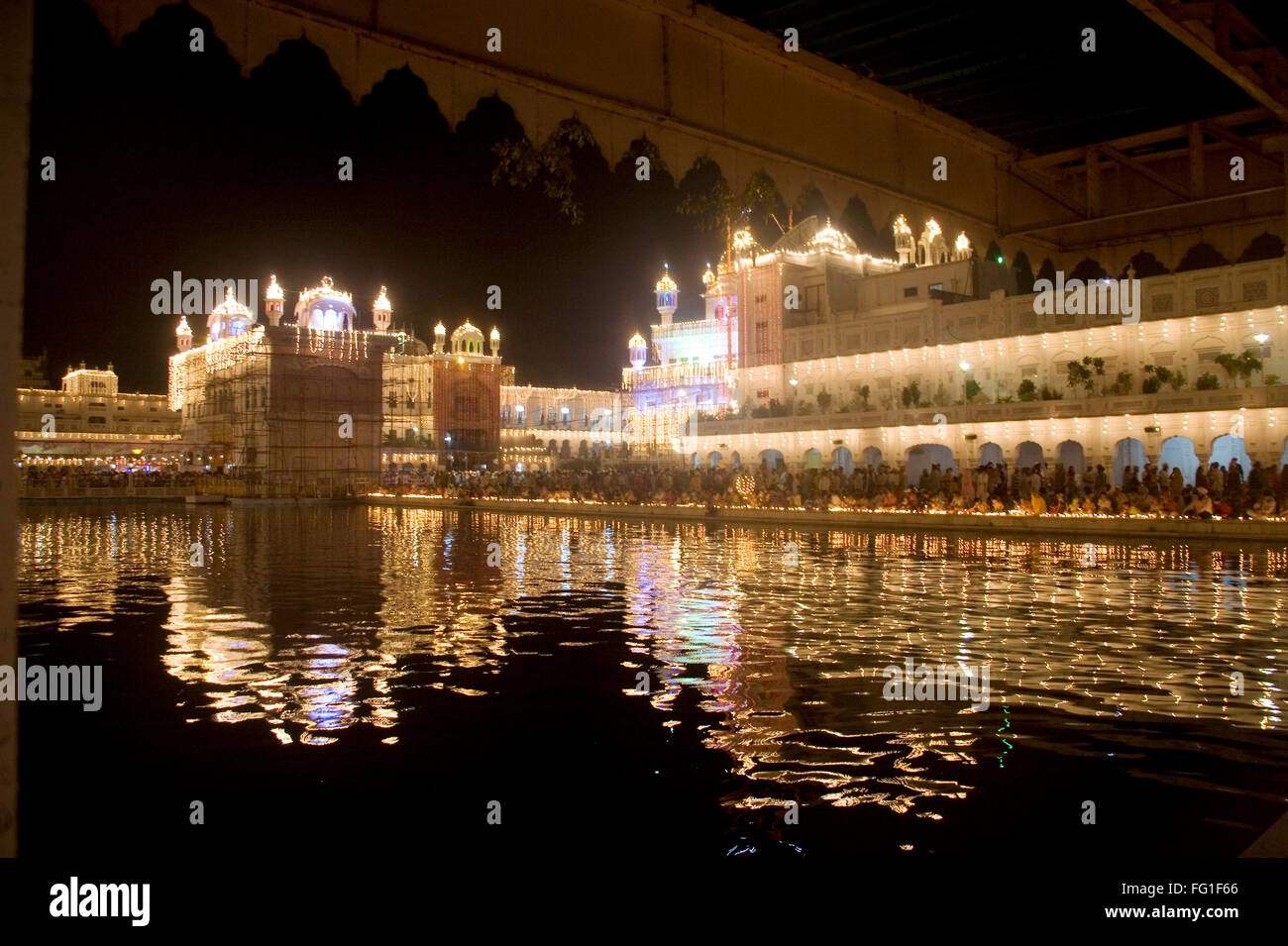 Illuminated Harimandir Sahib swarn mandir or golden temple reflection ...
