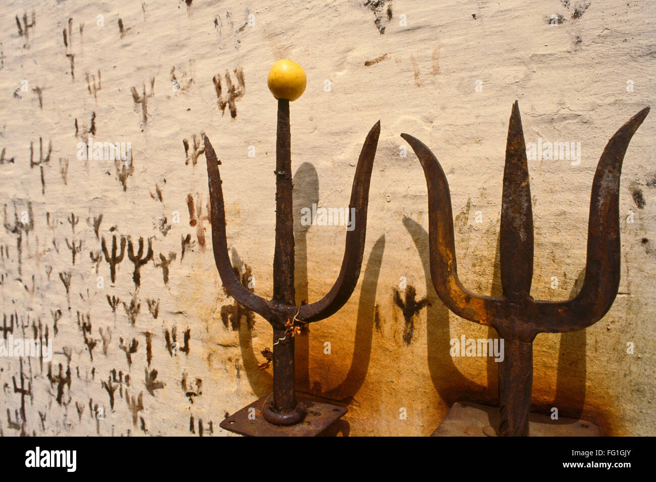Shiva Iron trident with lemon on top Stock Photo - Alamy