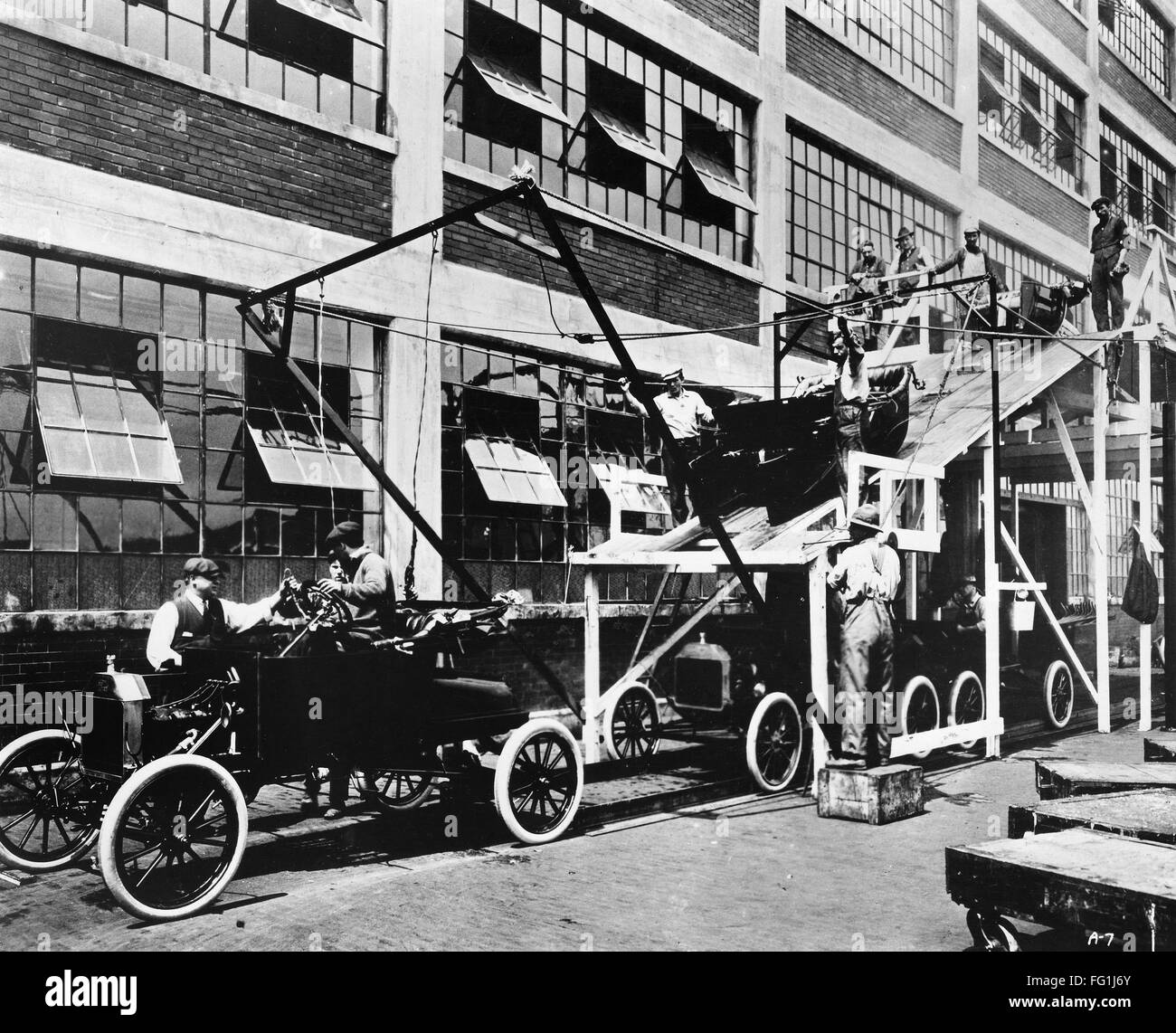FORD ASSEMBLY LINE, 1913. /nThe last stage of the Model T assembly line ...