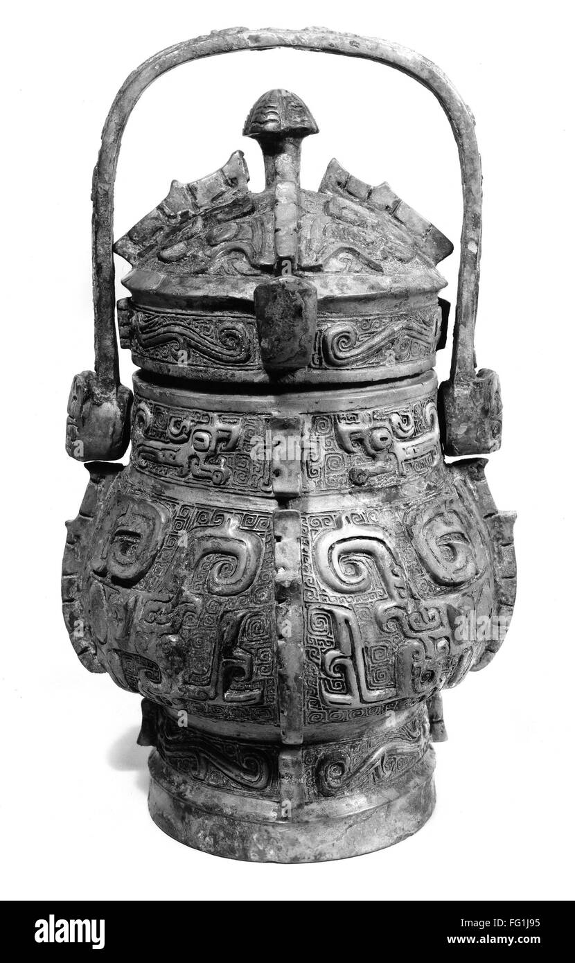CHINA: BRONZE VESSEL. /nA covered ritual wine vessel, bronze, Shang ...