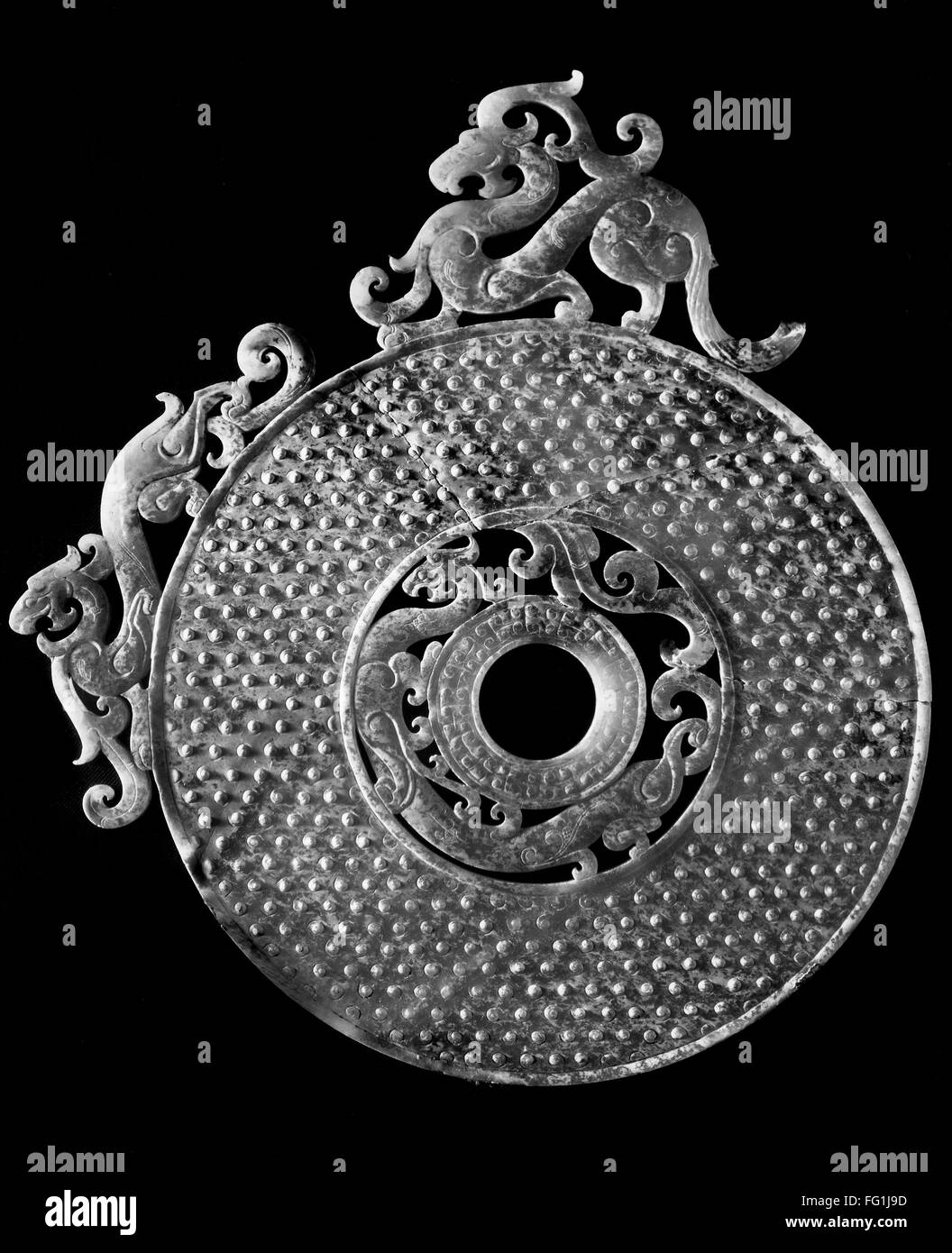 CHINA: JADE DISK. /nCarved jade bi disk, made during the Warring States ...