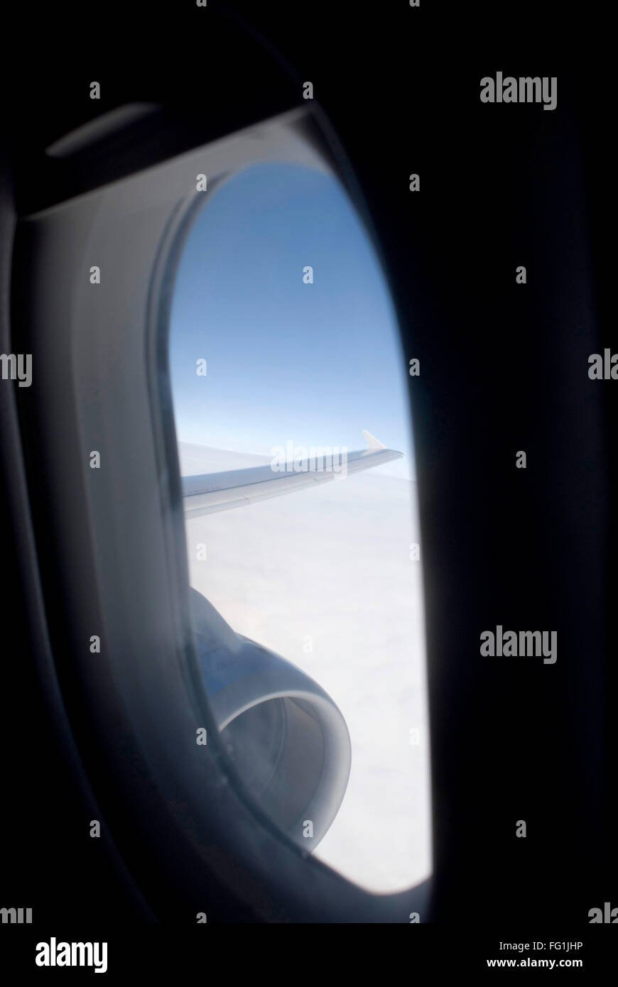 View of Engine and Wing Through Aeroplane Window Stock Photo - Alamy
