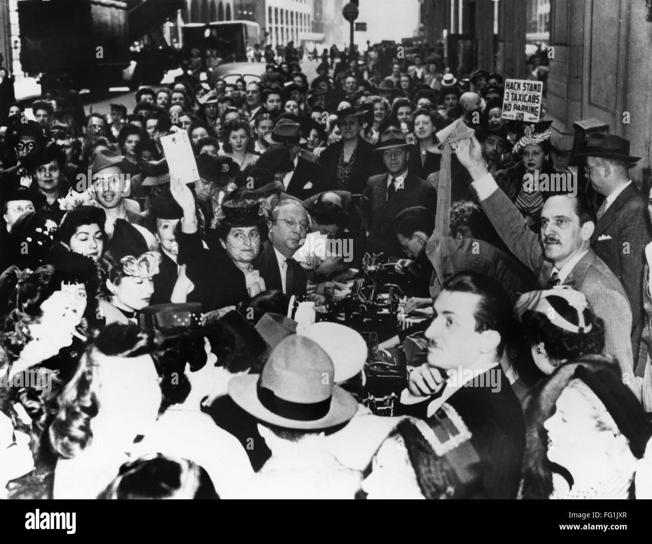 NEW YORK: NYLON SALE, 1940. /nA crowd of shoppers buying nylon ...