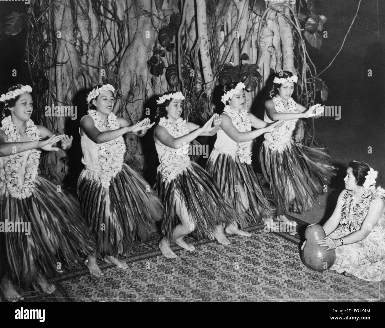 HAWAII: HULA DANCERS, 1938. /nNative Hawaiian hula dancers at a luau ...