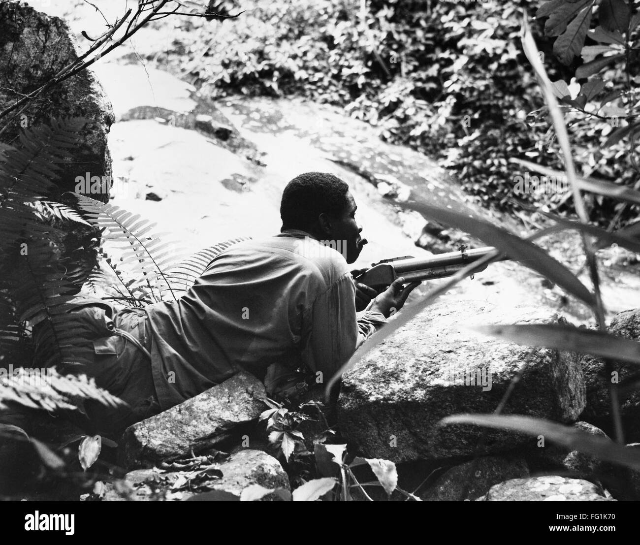 VIETNAM WAR, 1968. /nAmerican soldier J.E. Belaford keeping watch near ...