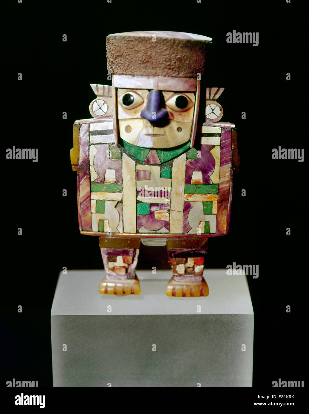 PERU: WARI FIGURE. /nWood figure of a dignitary with inlaid shell ...