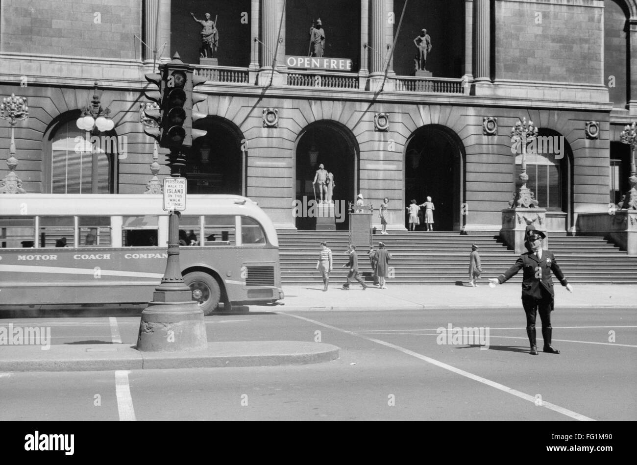 CHICAGO: ART INSTITUTE, 1940. /nA police officer directing traffic ...