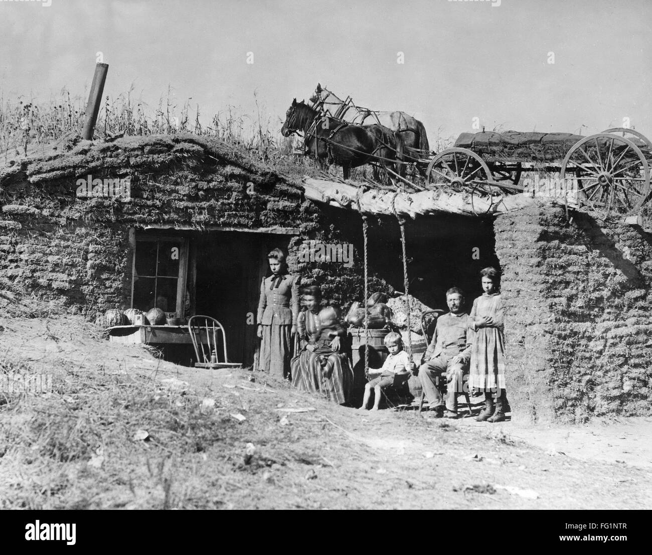 NEBRASKA: SETTLERS, 1892. /nA homesteader family in front of their sod ...