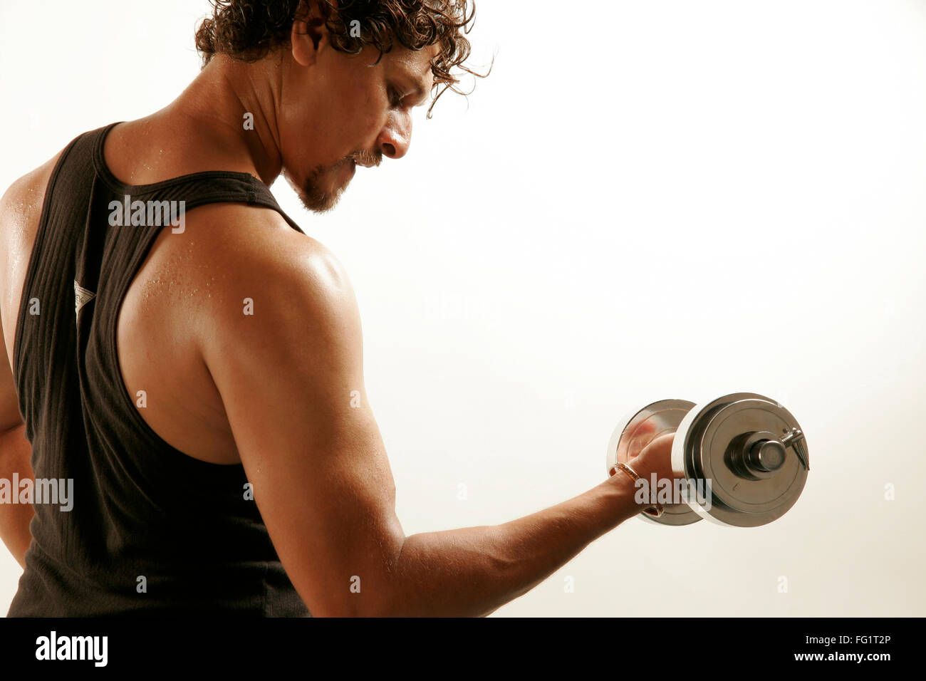 South indian man standing arms hi-res stock photography and images - Alamy