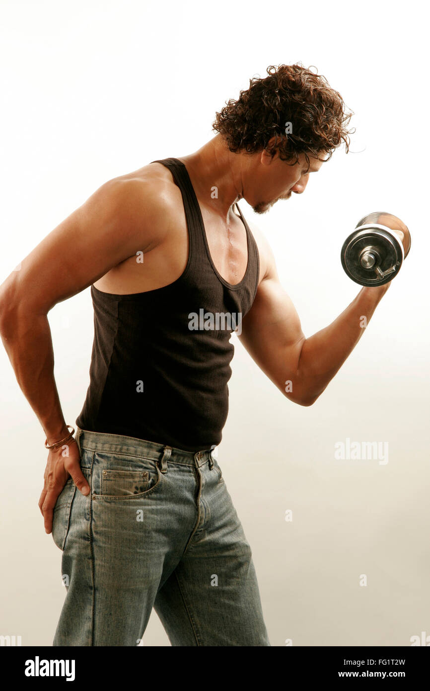 South indian man standing arms hi-res stock photography and images - Alamy