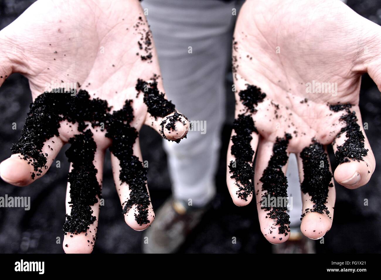 Hands with mud hi-res stock photography and images - Alamy