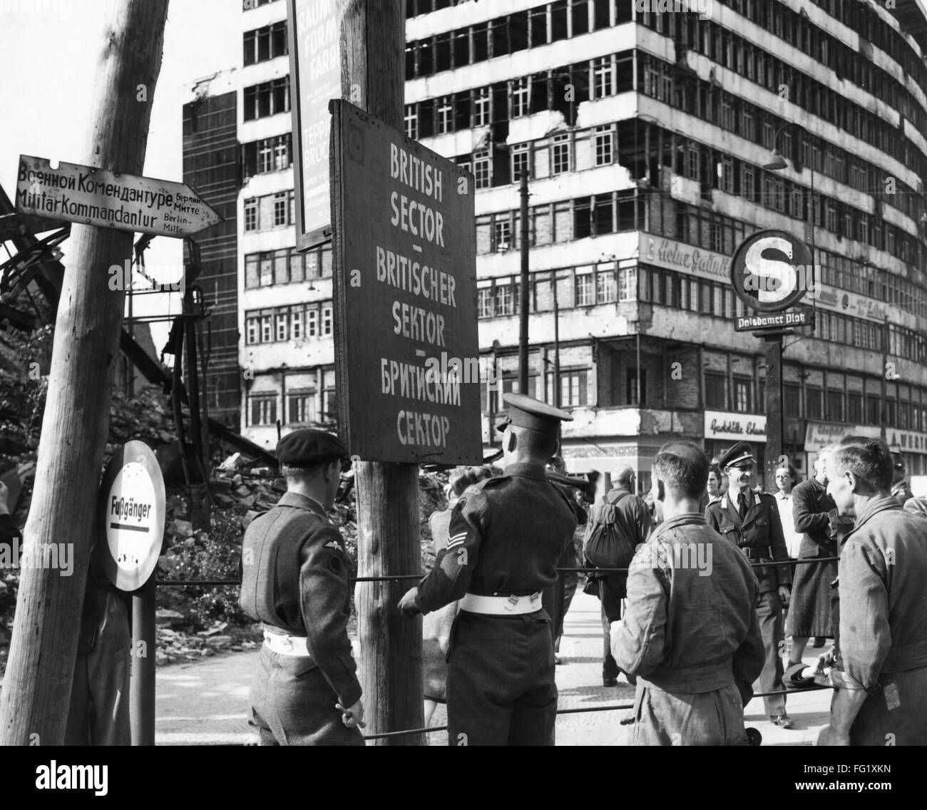 BERLIN, 1948. /nBritish military police erecting a sign to mark the ...