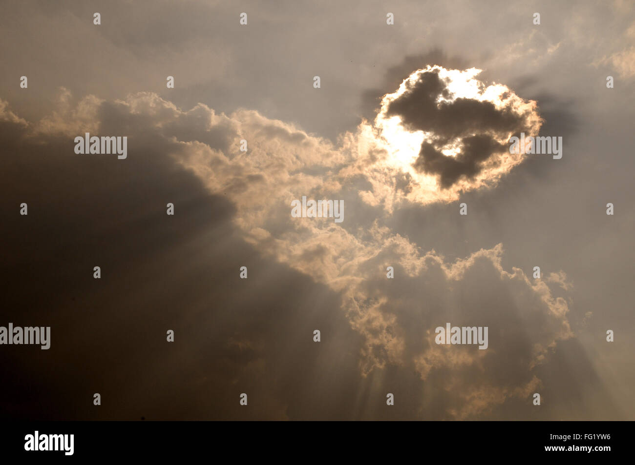 Sunset with dark clouds ; Khidrapur ; Kolhapur ; Maharashtra ; India 16 ...