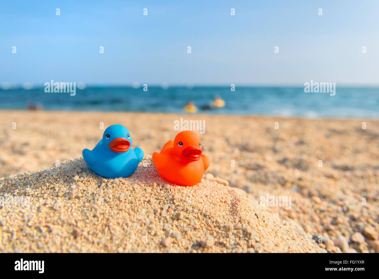 Blue and white windmill toy at the beach Stock Photo - Alamy
