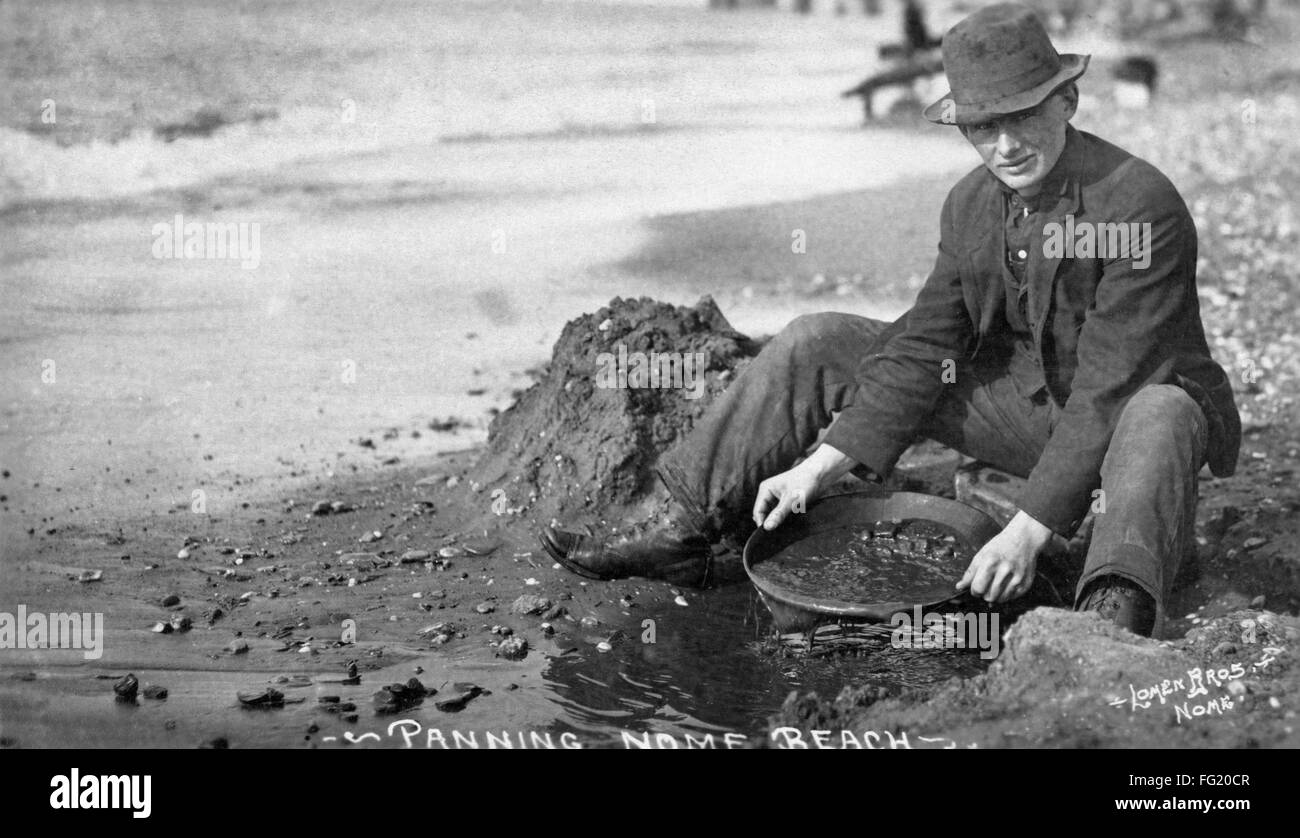 ALASKA: MINING, c1915. /nA prospector panning for gold in Nome, Alaska ...