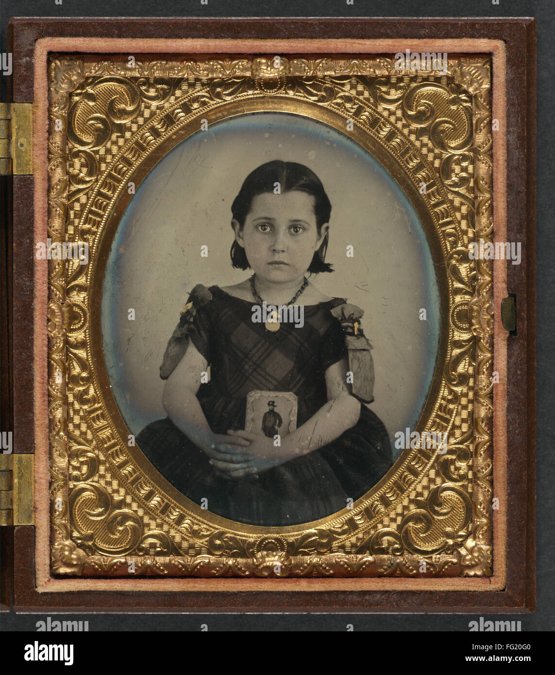 CIVIL WAR: MOURNING, c1865. /nPortrait of a girl wearing a mourning ...